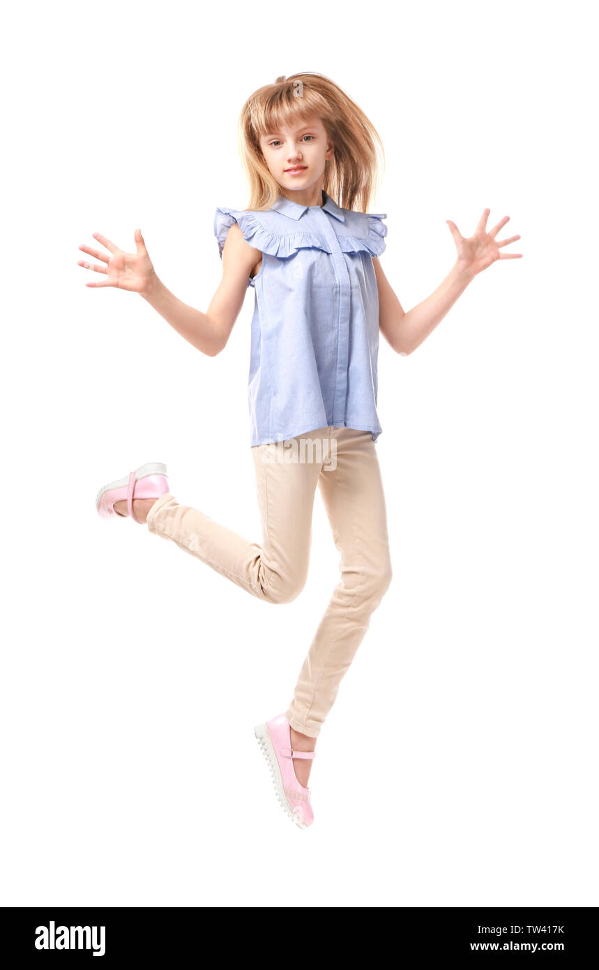 Little jumping girl on white background Stock Photo - Alamy