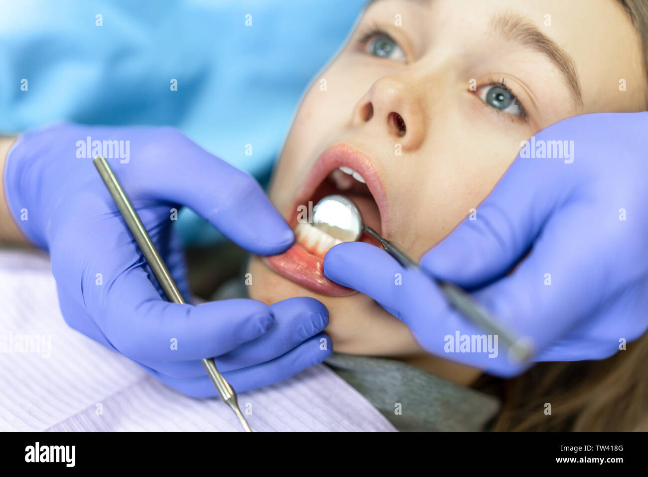 Dental clinic. Reception, examination of the patient. Teeth care. Young ...