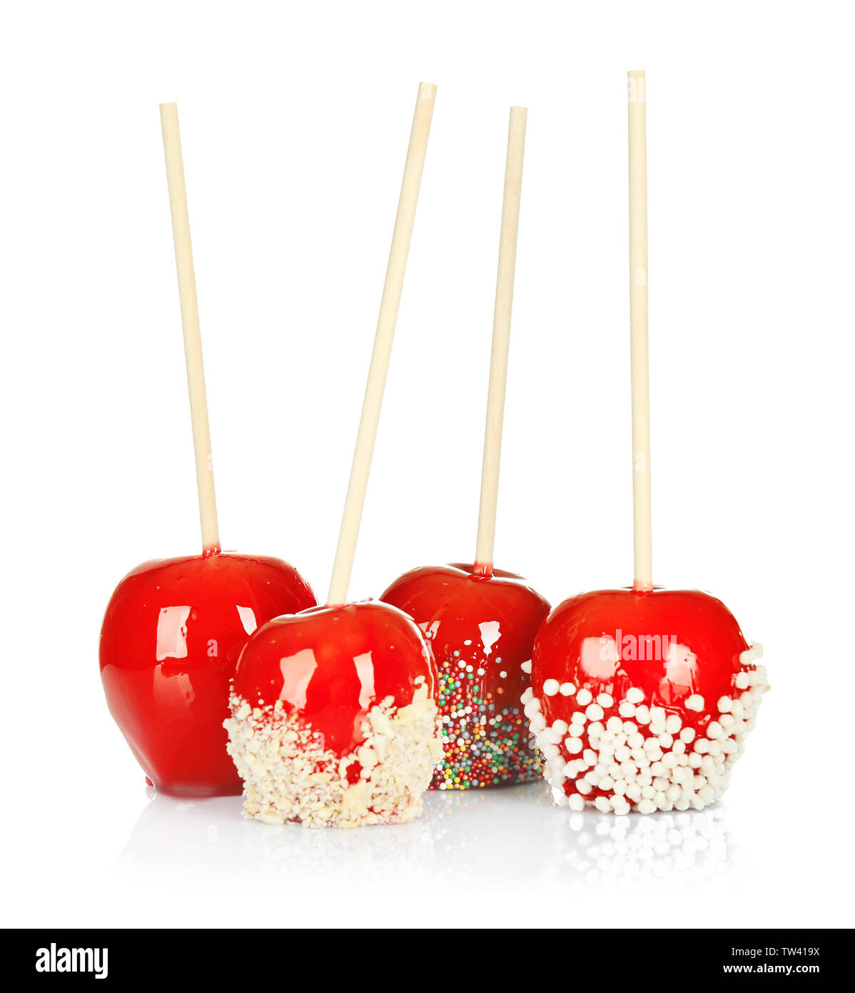 Delicious candy apples on white background Stock Photo - Alamy