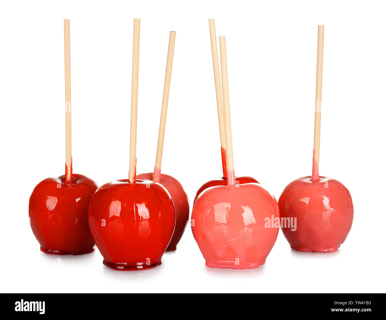 Delicious candy apples on white background Stock Photo - Alamy