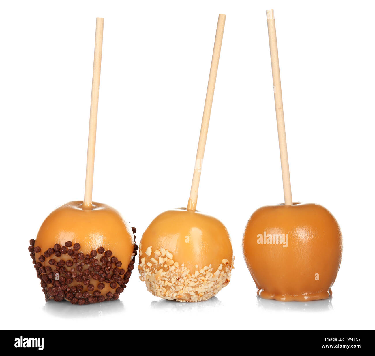 Delicious candy apples on white background Stock Photo - Alamy