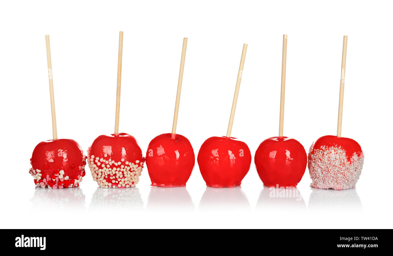 Delicious candy apples on white background Stock Photo - Alamy