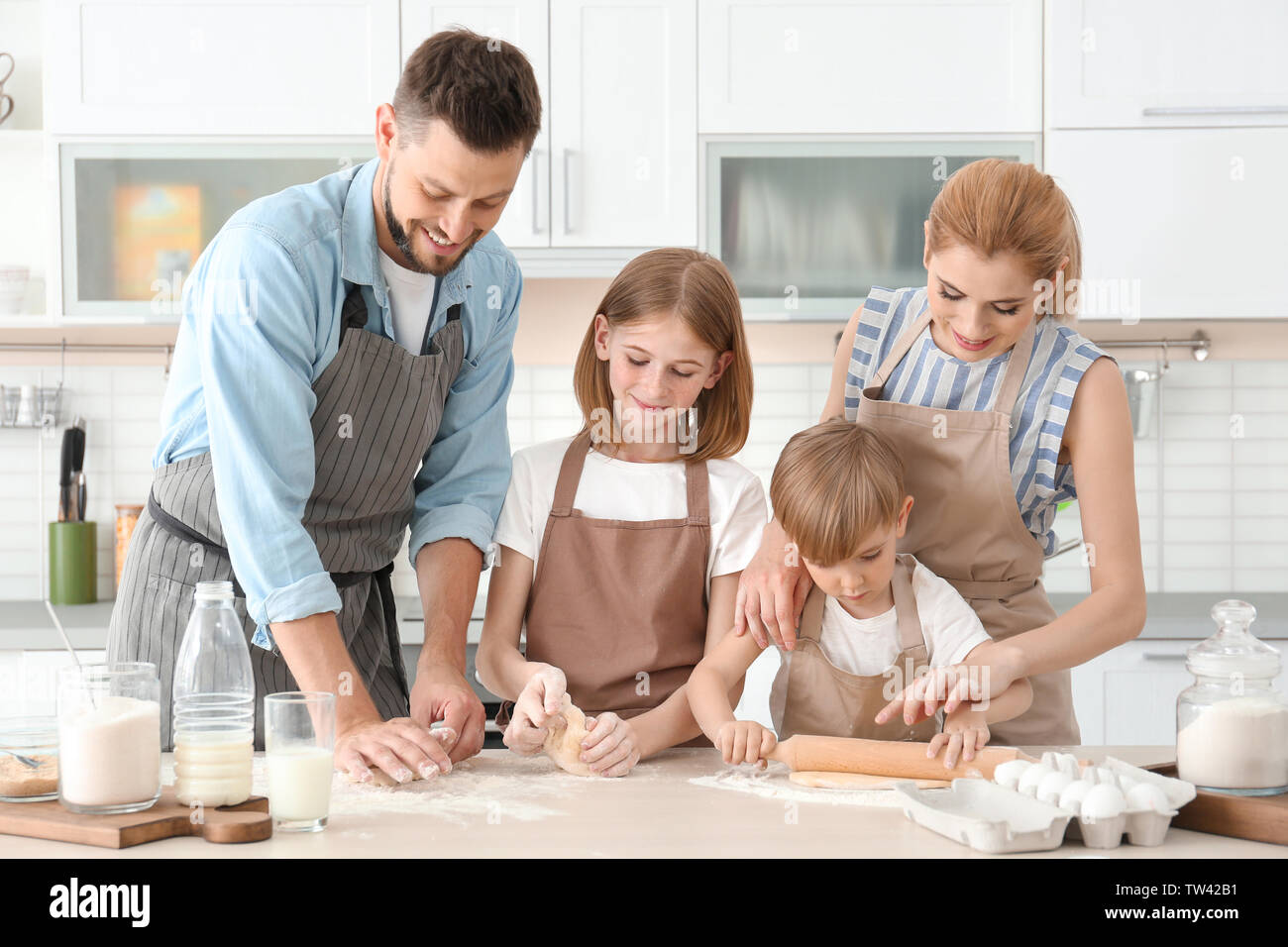 Family cooking in kitchen. Cooking classes concept Stock Photo - Alamy