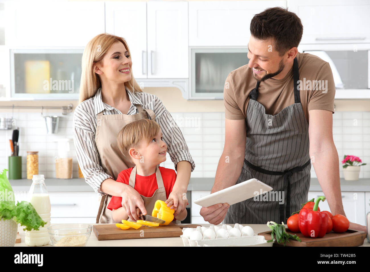 Family cooking in kitchen. Cooking classes concept Stock Photo - Alamy