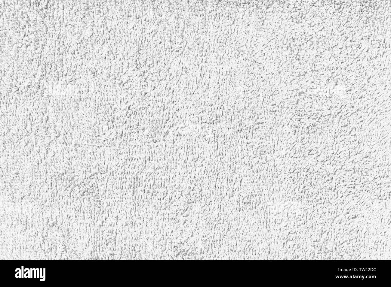 White terry towel background. Close-up fabric texture. Top view. Copy ...