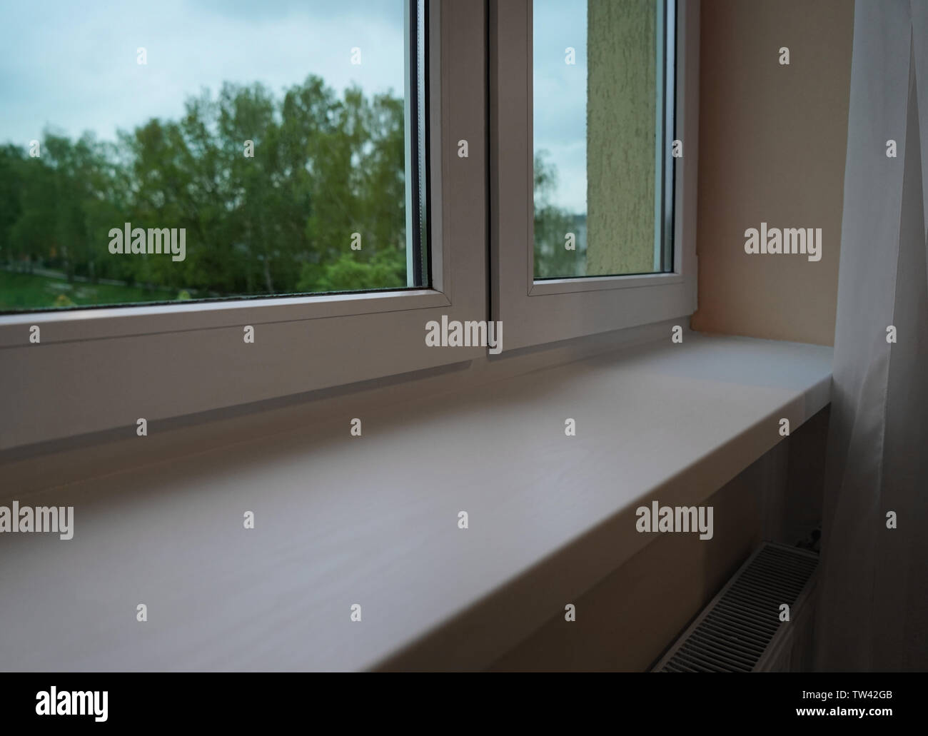 Modern plastic window sill indoors Stock Photo - Alamy