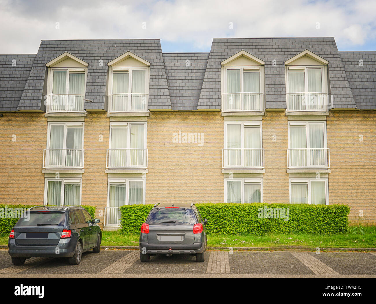 Three storeyed hi-res stock photography and images - Alamy