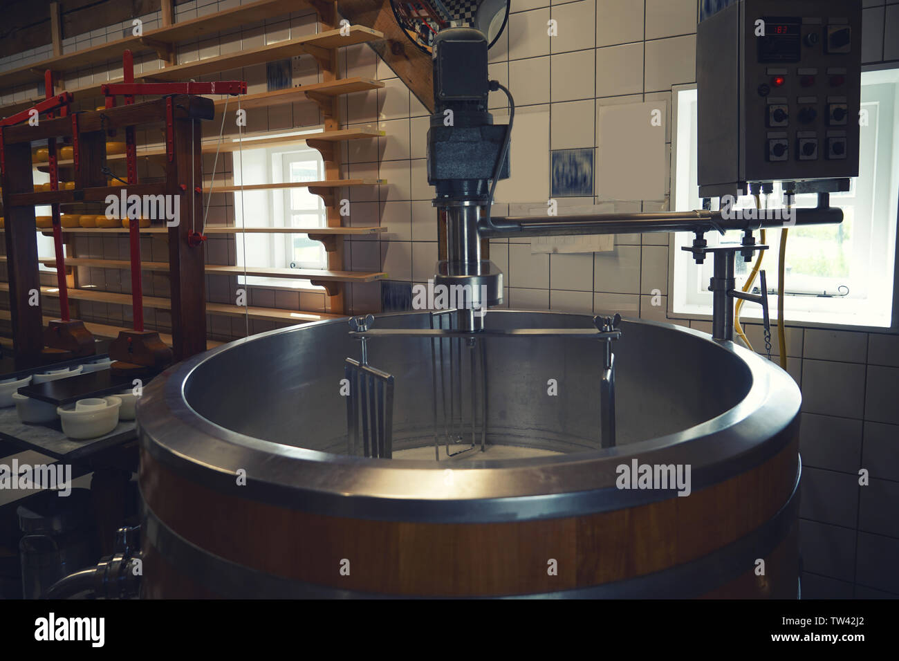 Machine for cheese production Stock Photo - Alamy