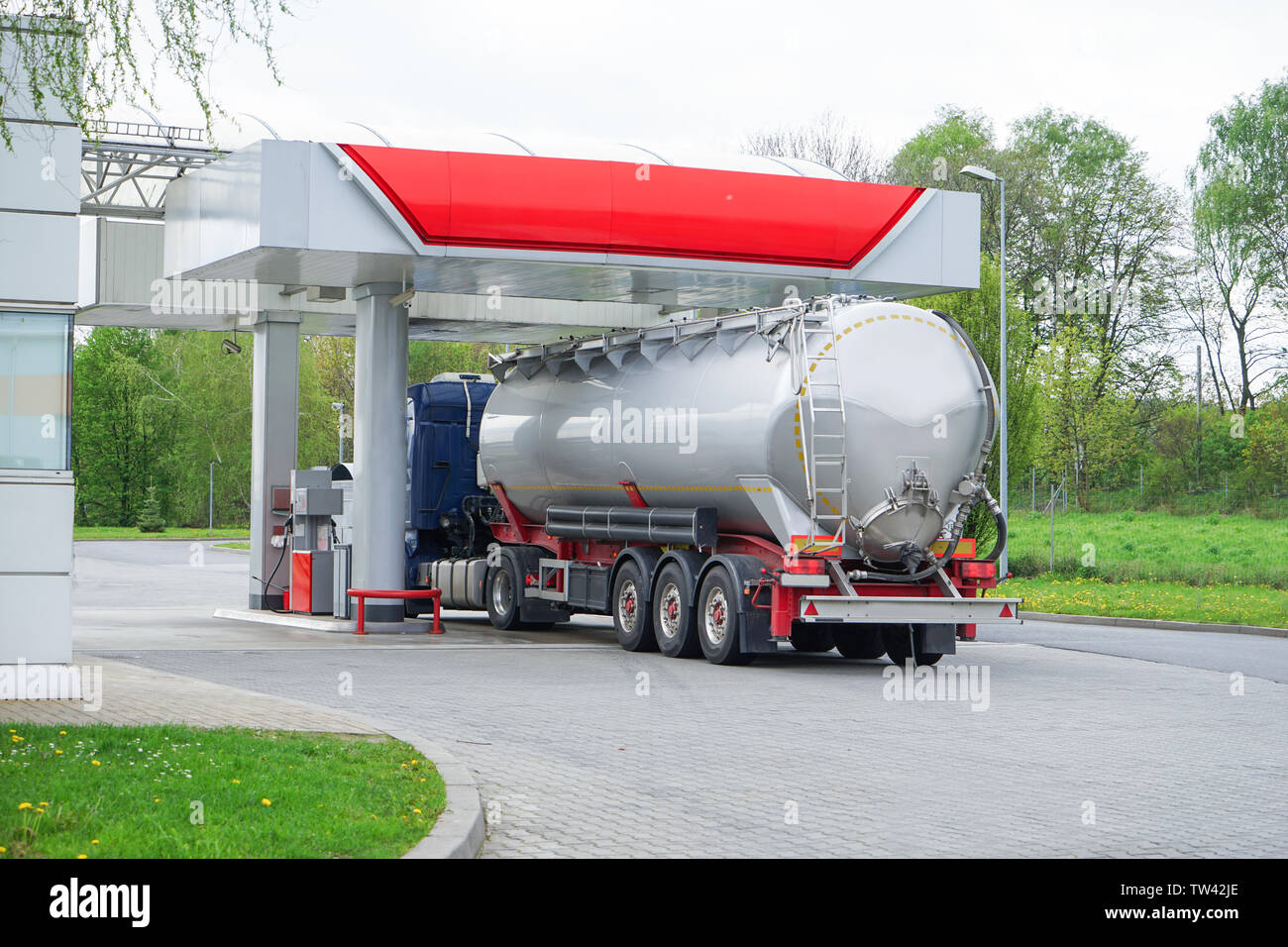 View of gas petrol station with cistern car Stock Photo - Alamy