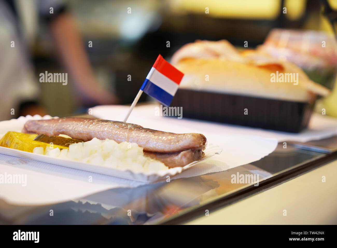 Ingredients for traditional Dutch snack with raw herring in container ...