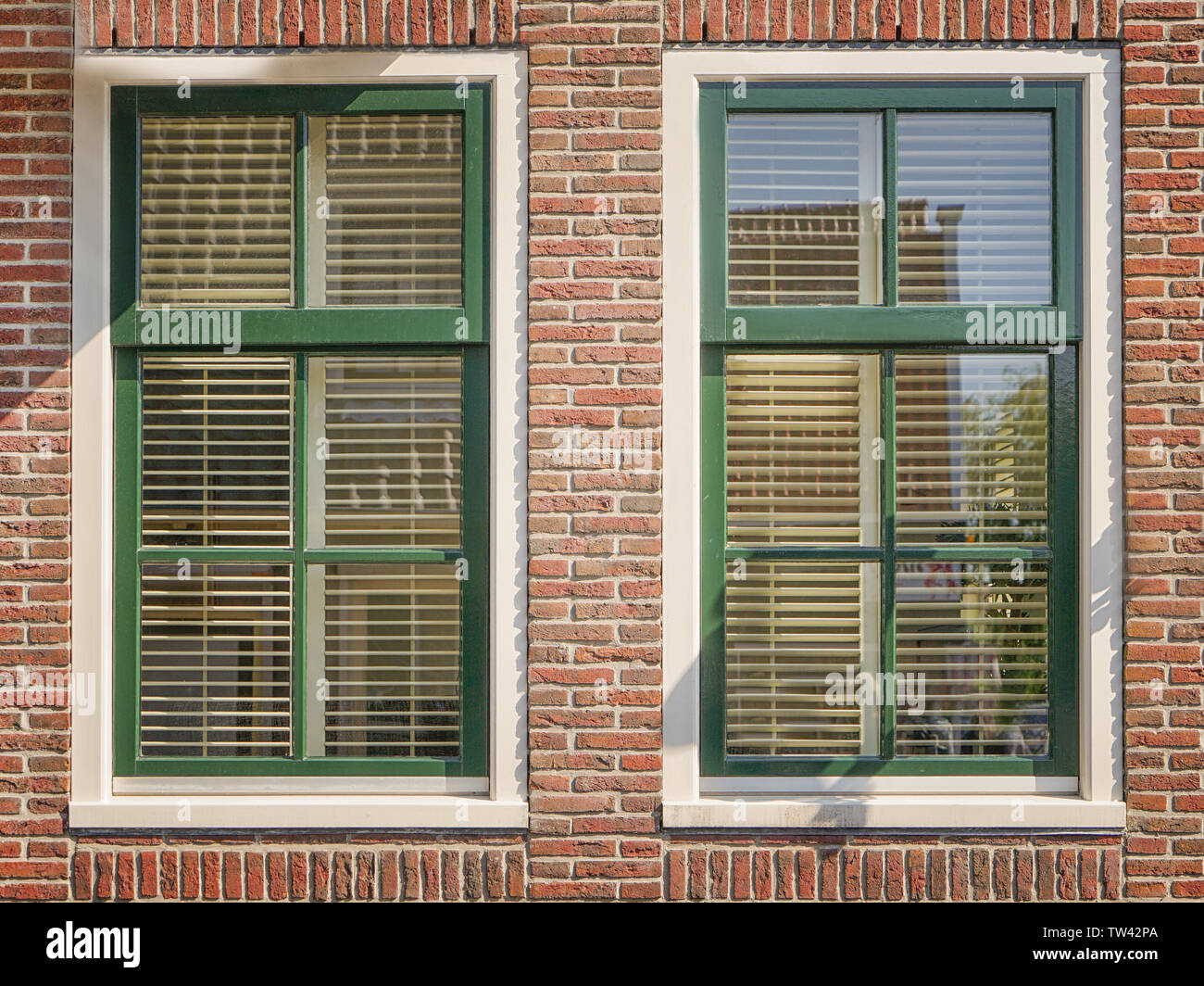 Building with modern windows Stock Photo - Alamy