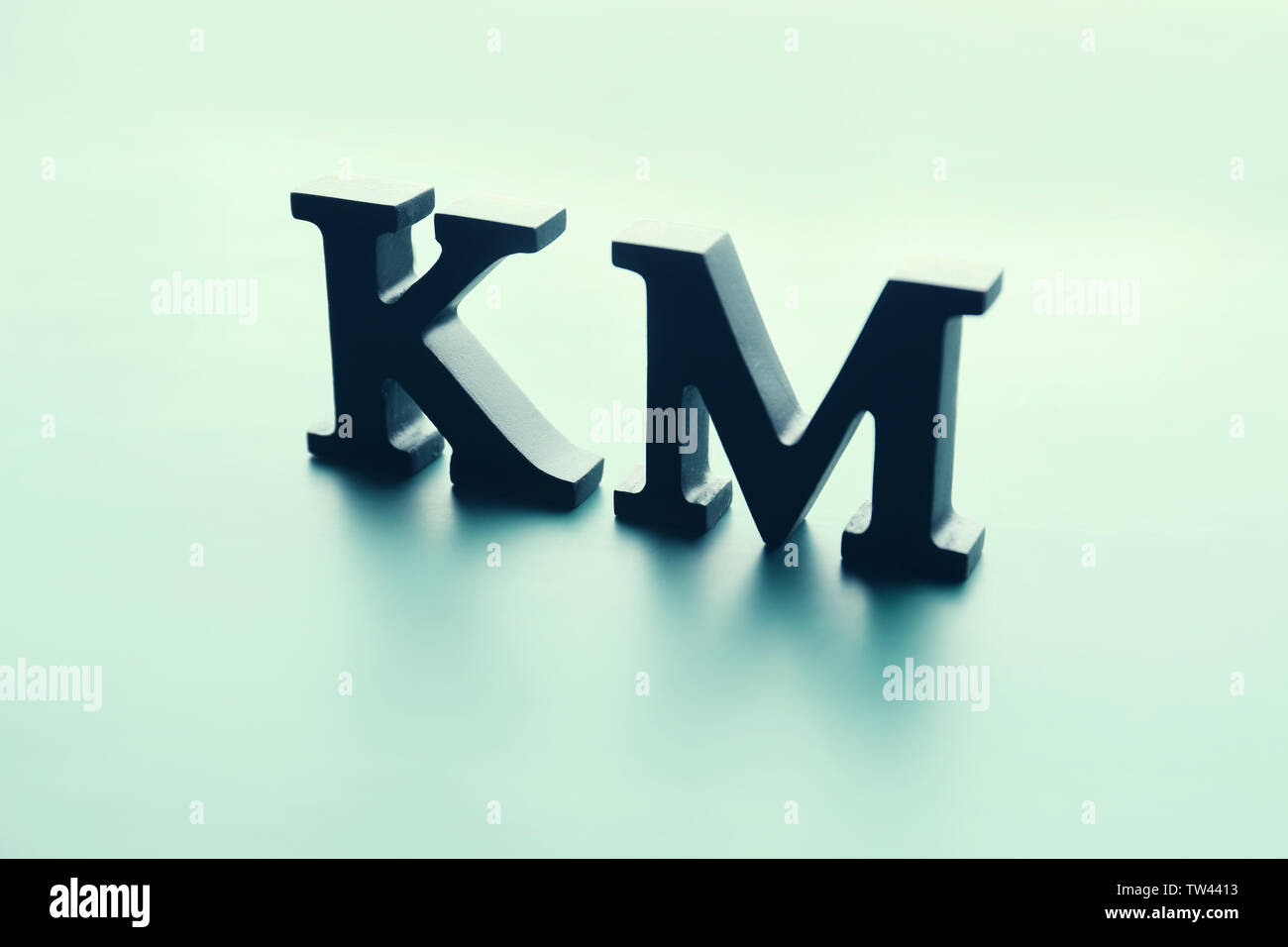 Management abbreviation KM made with letters on light background Stock ...