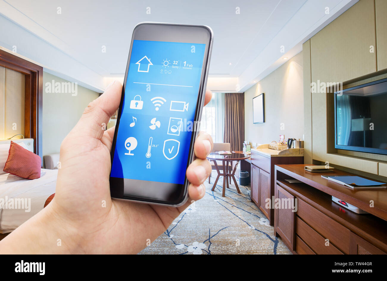 Smartphone with modern twin bedroom Stock Photo - Alamy