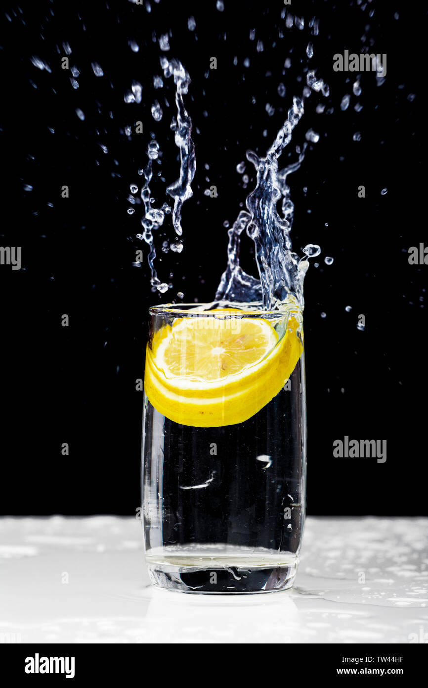 Splash clear lemonade Stock Photo - Alamy