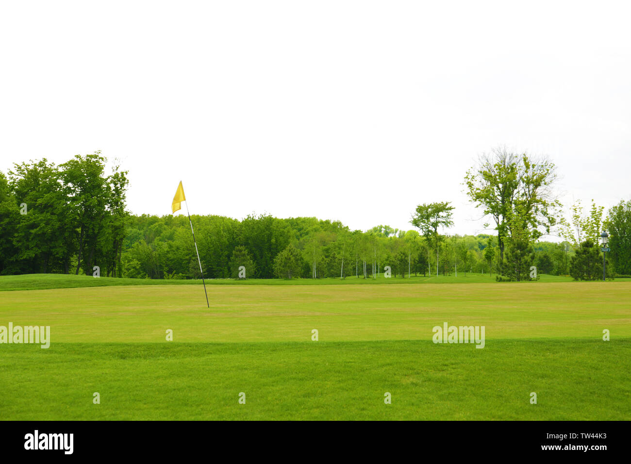 Landscape with big golf course on summer day Stock Photo - Alamy