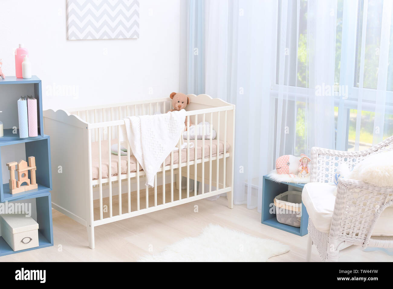 Modern interior design of baby room with crib Stock Photo - Alamy