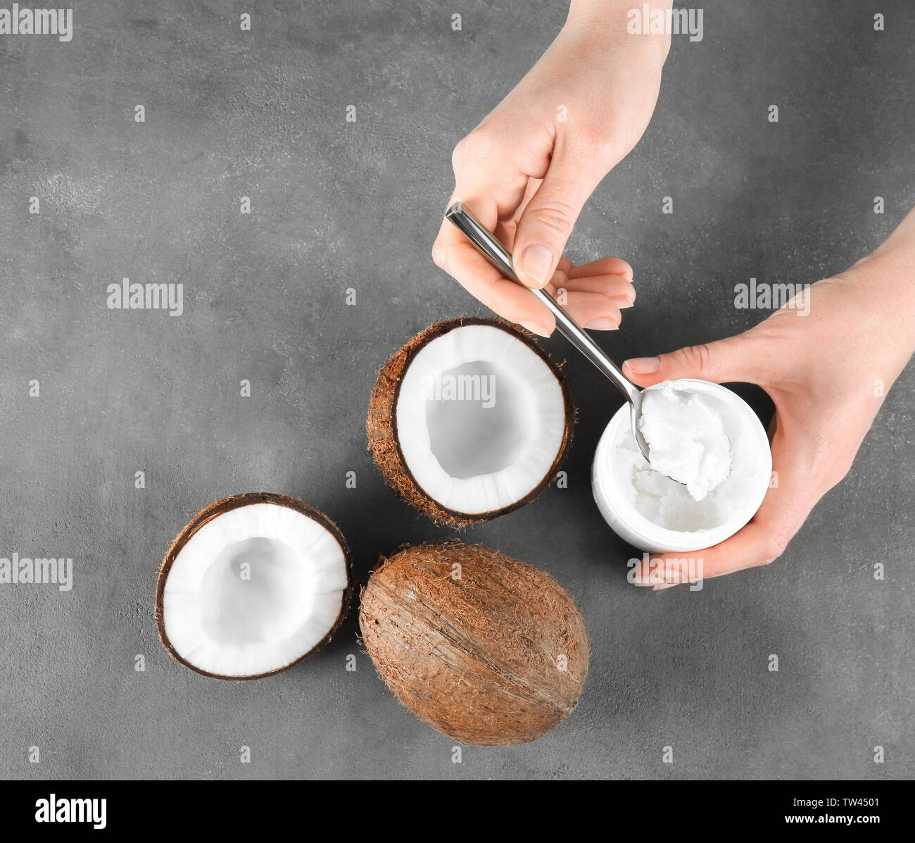 Woman coconut oil cook hi-res stock photography and images - Alamy