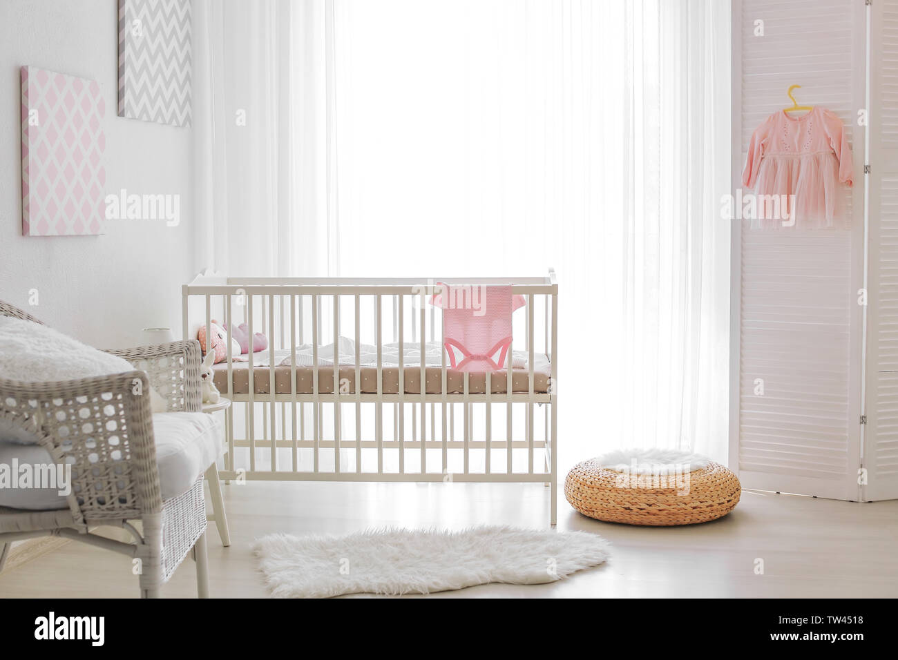 Modern interior design of baby room with crib Stock Photo - Alamy