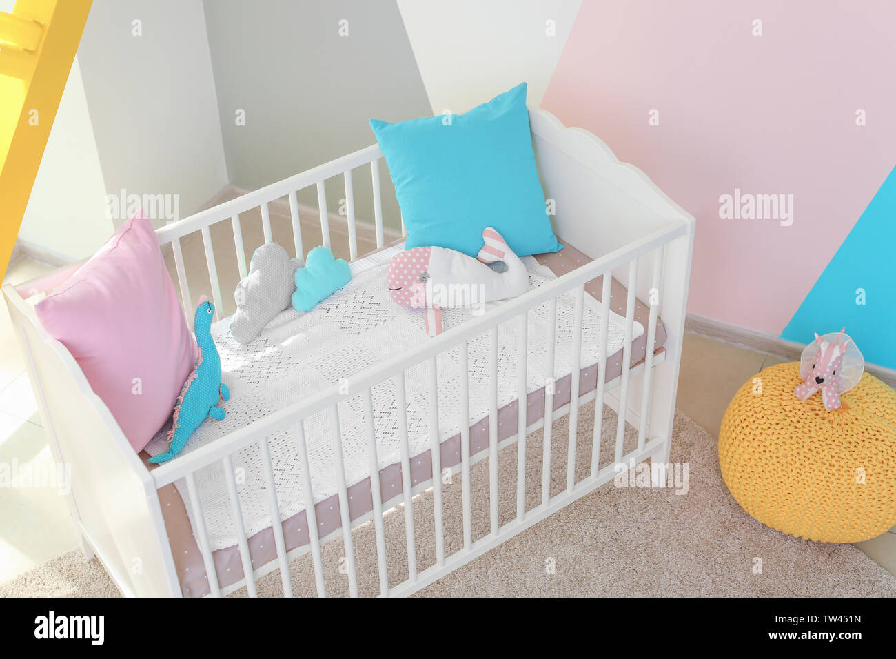Beautiful crib in baby room Stock Photo - Alamy