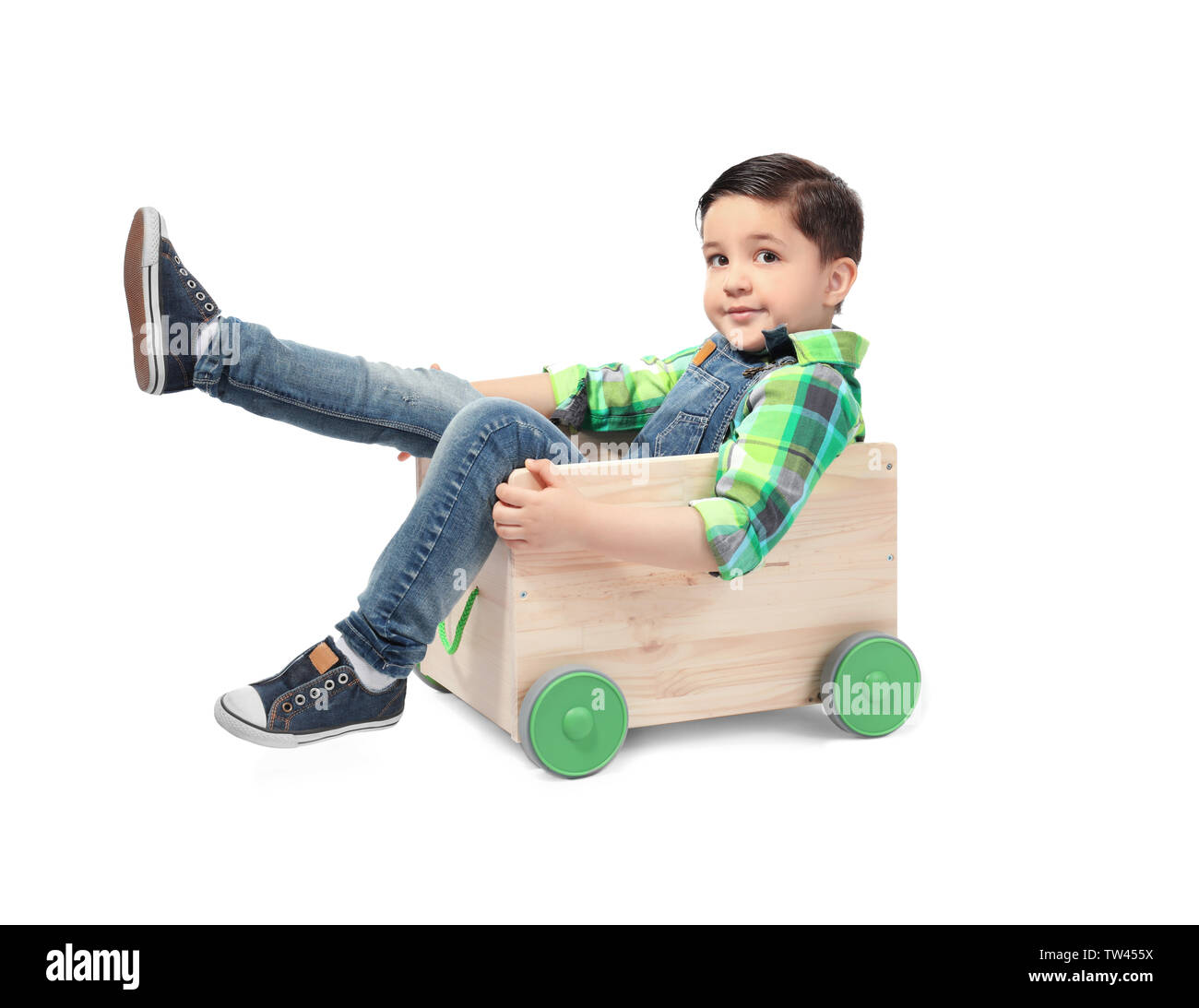 Cute little boy with wooden cart on white background Stock Photo - Alamy