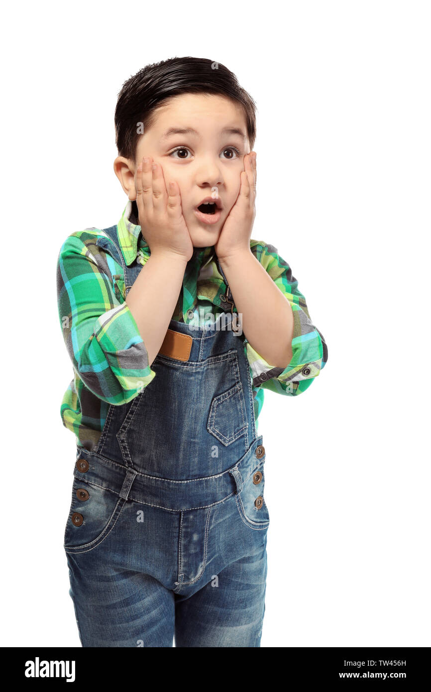 Cute little surprised boy on white background Stock Photo - Alamy