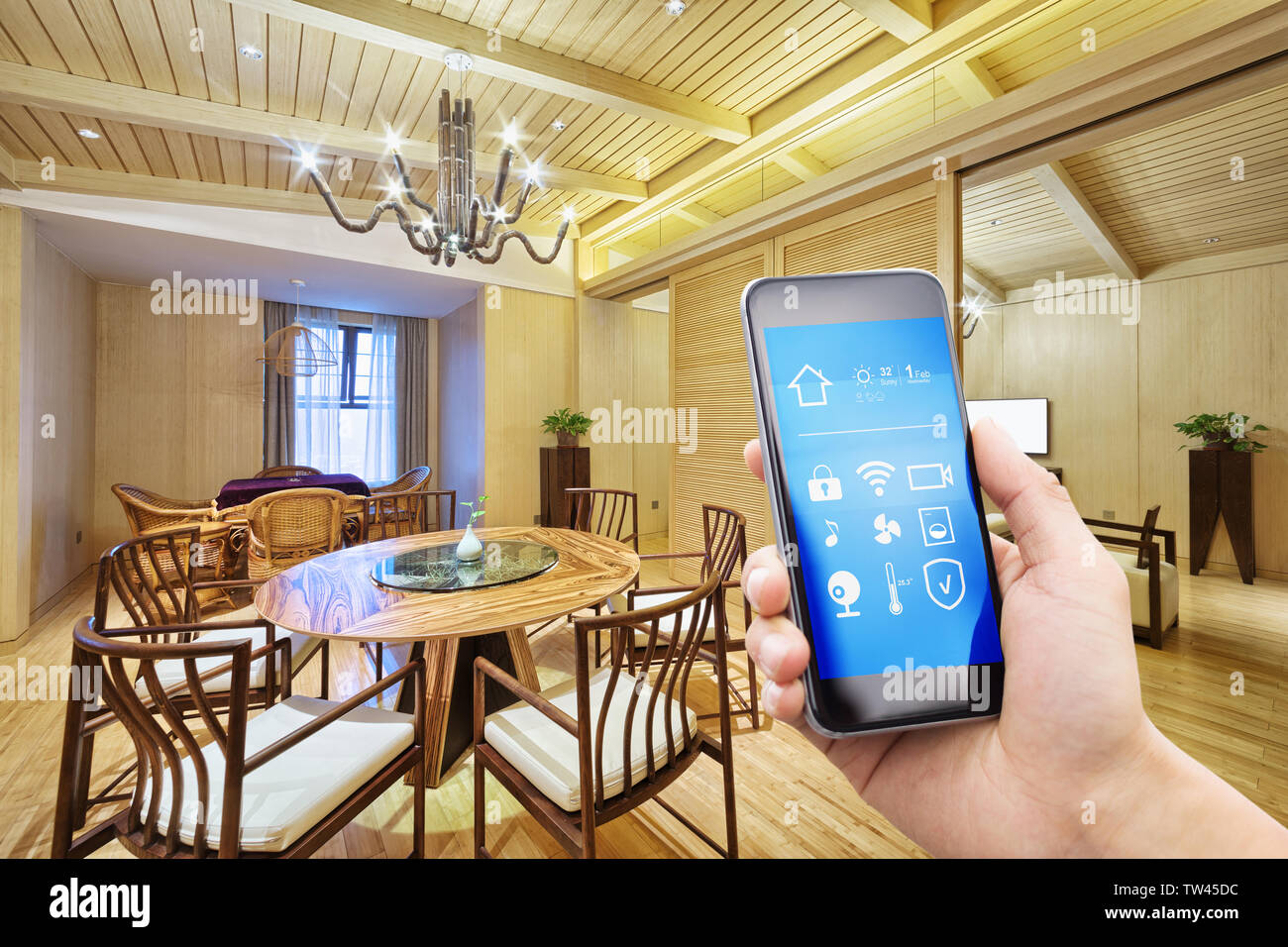 smart phone with smart home with modern dining room Stock Photo - Alamy