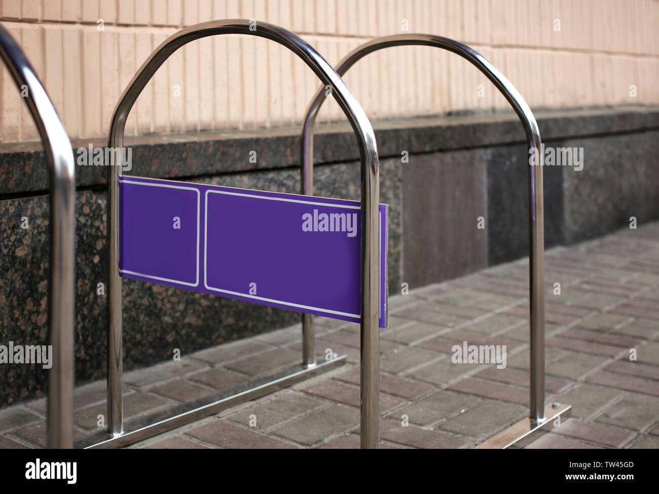 Empty bicycle rack near building outdoor Stock Photo - Alamy