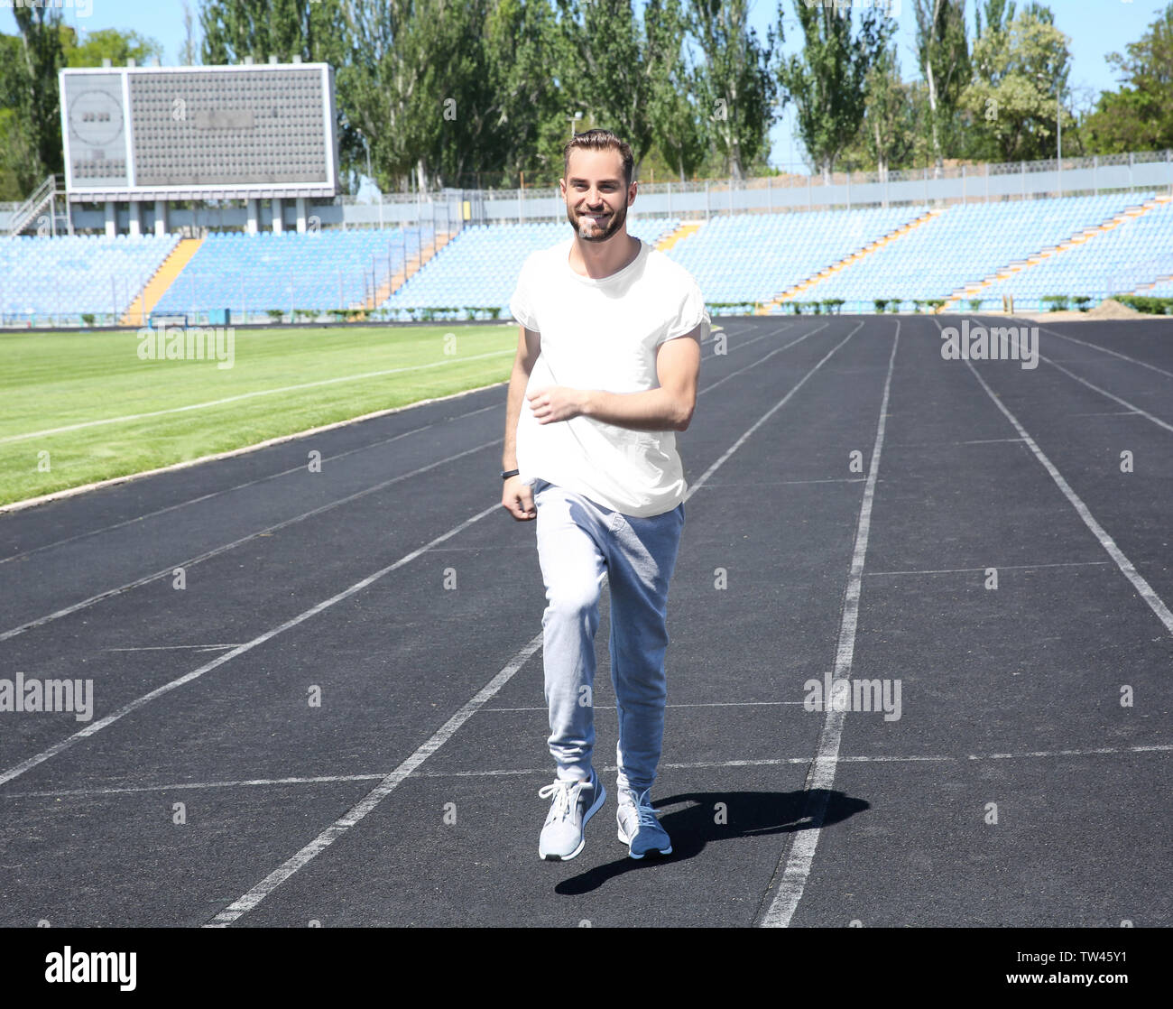 Young pumped up man running hi-res stock photography and images - Alamy