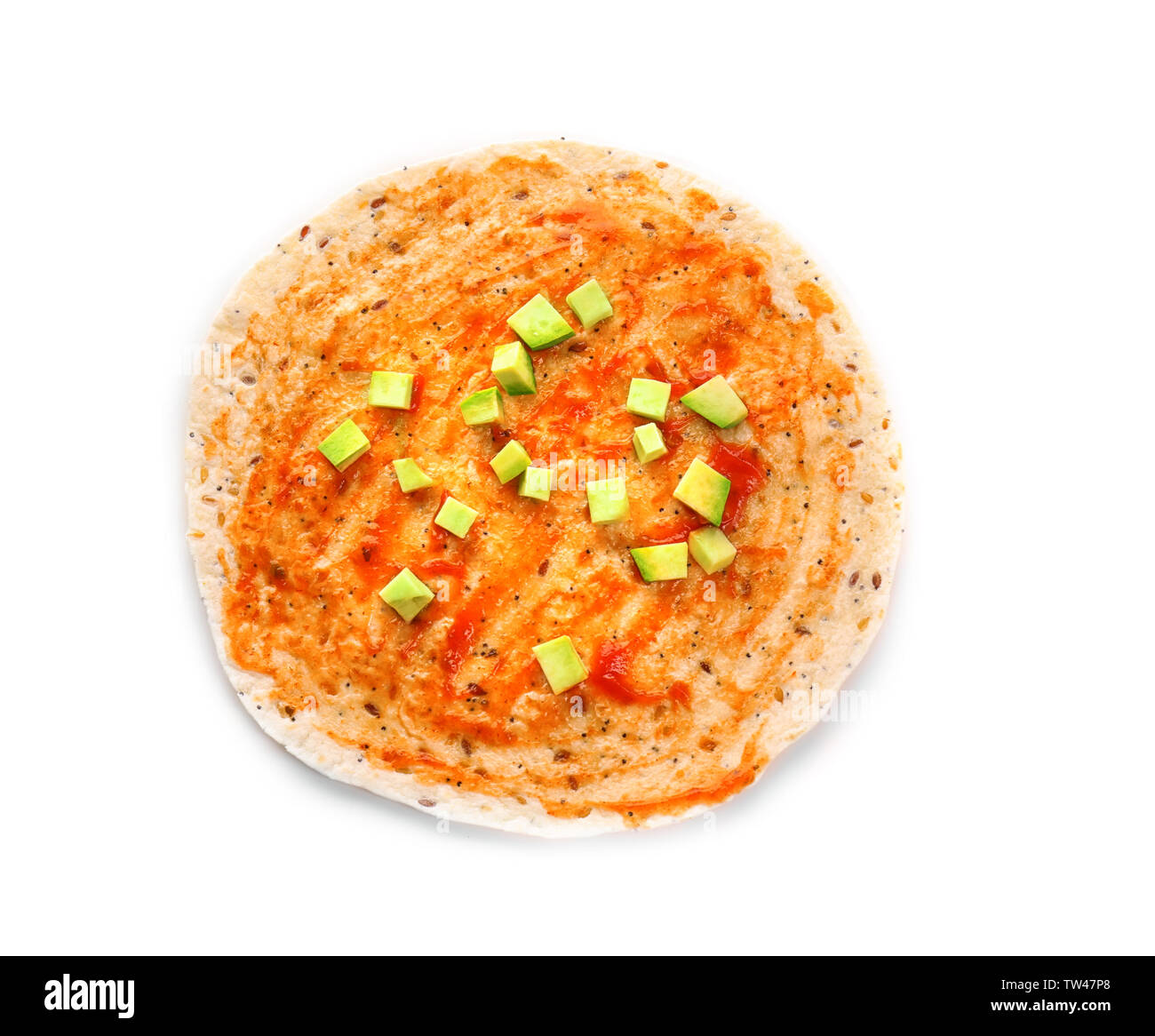 Flour tortilla with avocado on white background Stock Photo - Alamy
