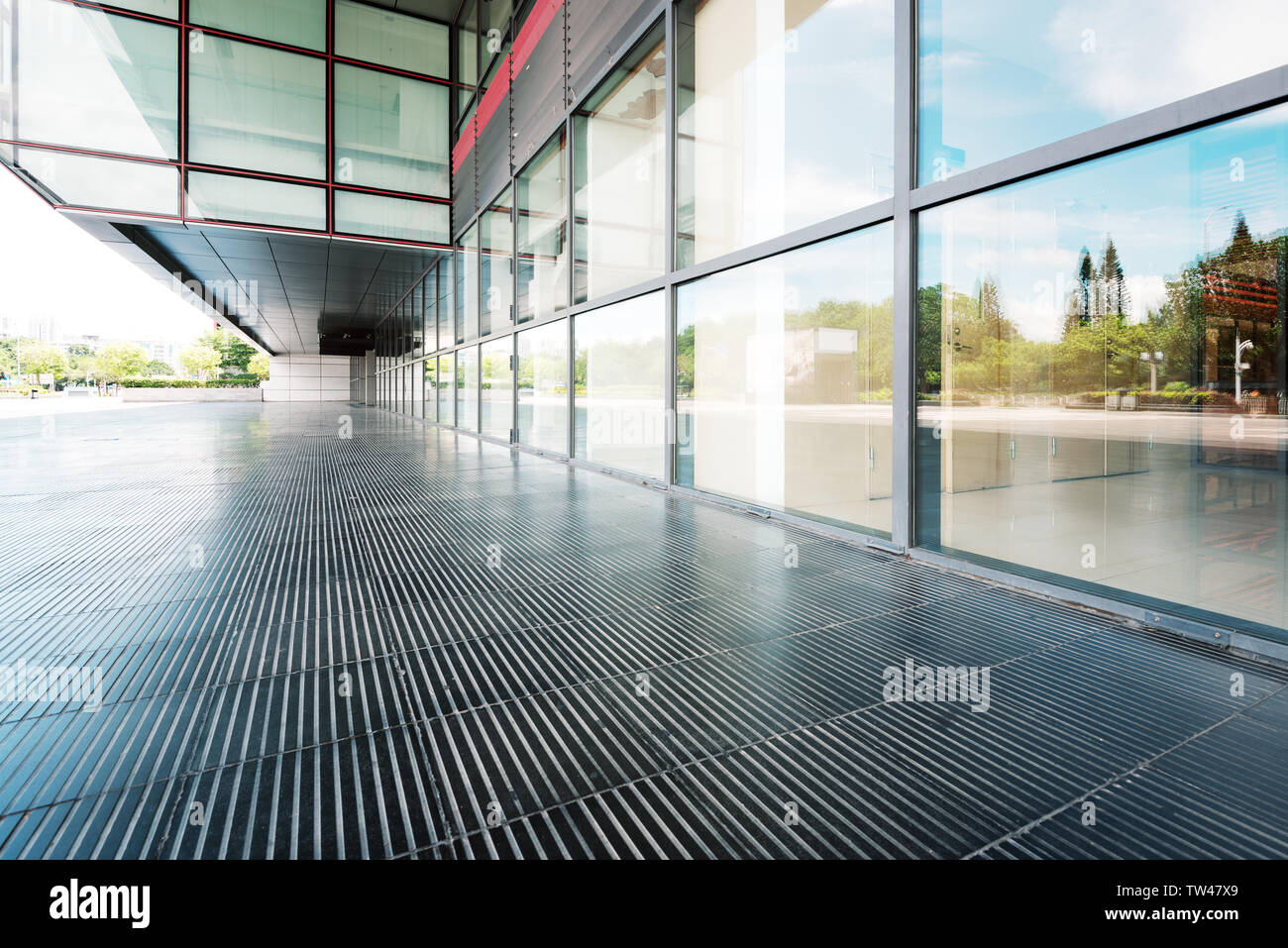 modern building glass wall and empty path Stock Photo - Alamy