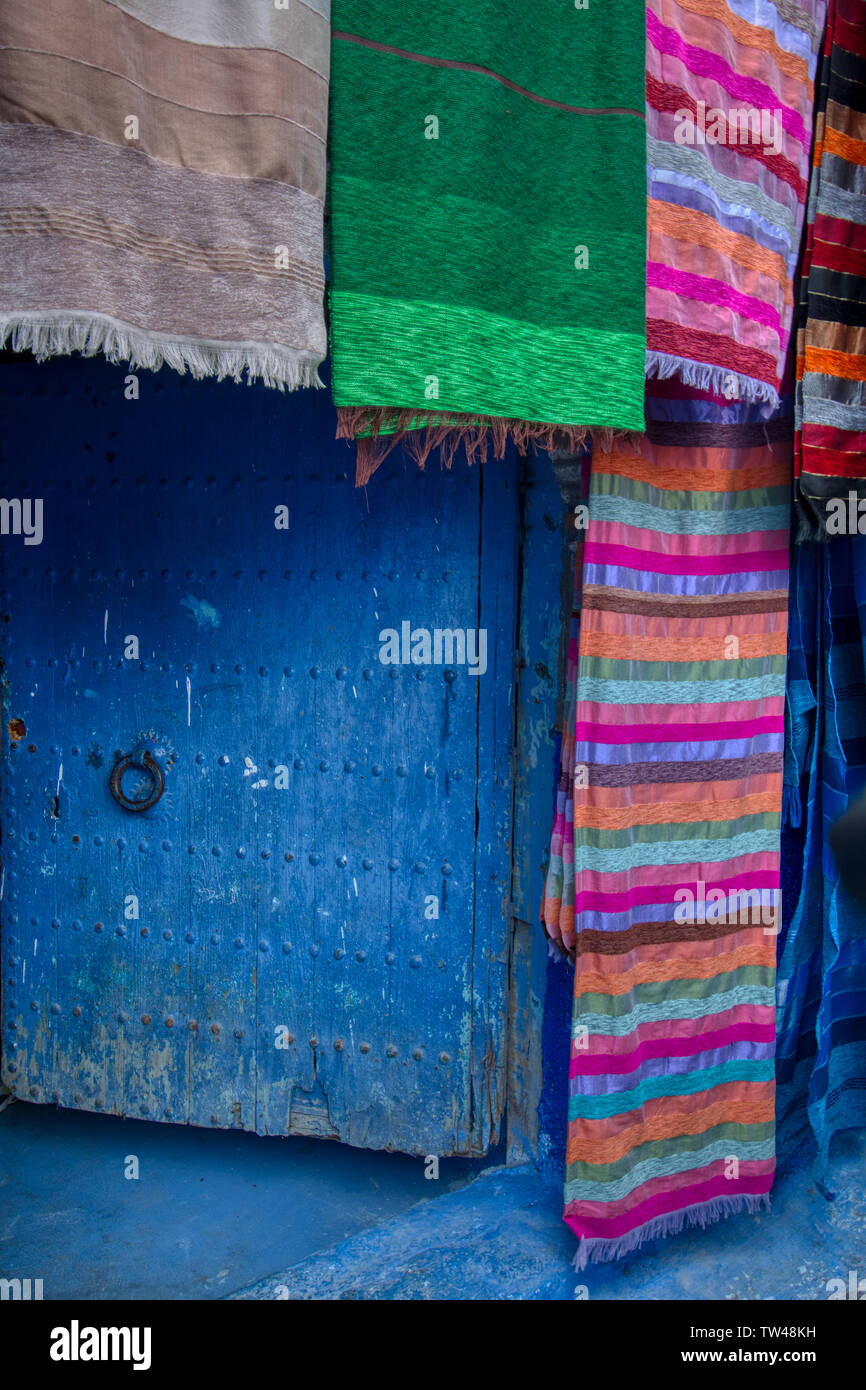 Textile crafts exposed on a street of Chefchaouen (or Chaouen), Morocco ...