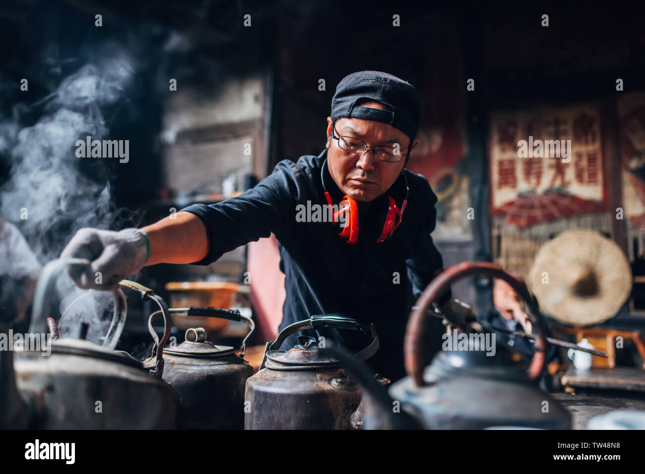 Tea guests and tea people in the old teahouse are tasting tea Stock ...
