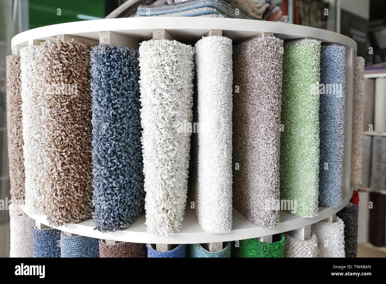 Assortment of carpet samples in shop Stock Photo - Alamy