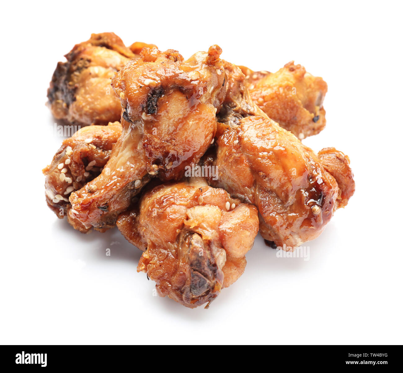 Roasted chicken legs on white background Stock Photo - Alamy