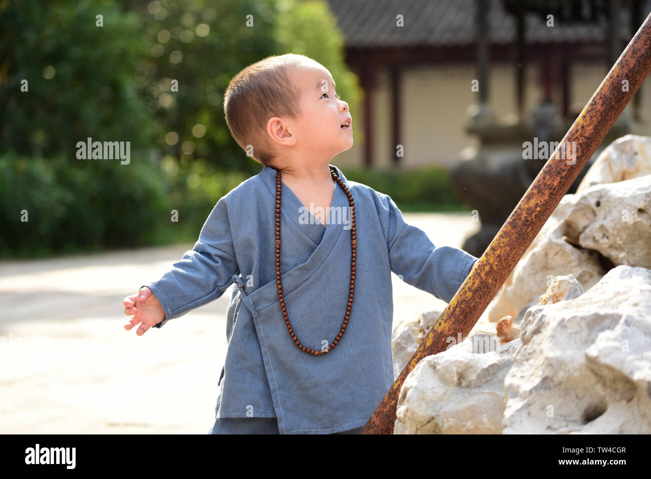 Cute little monk Stock Photo - Alamy