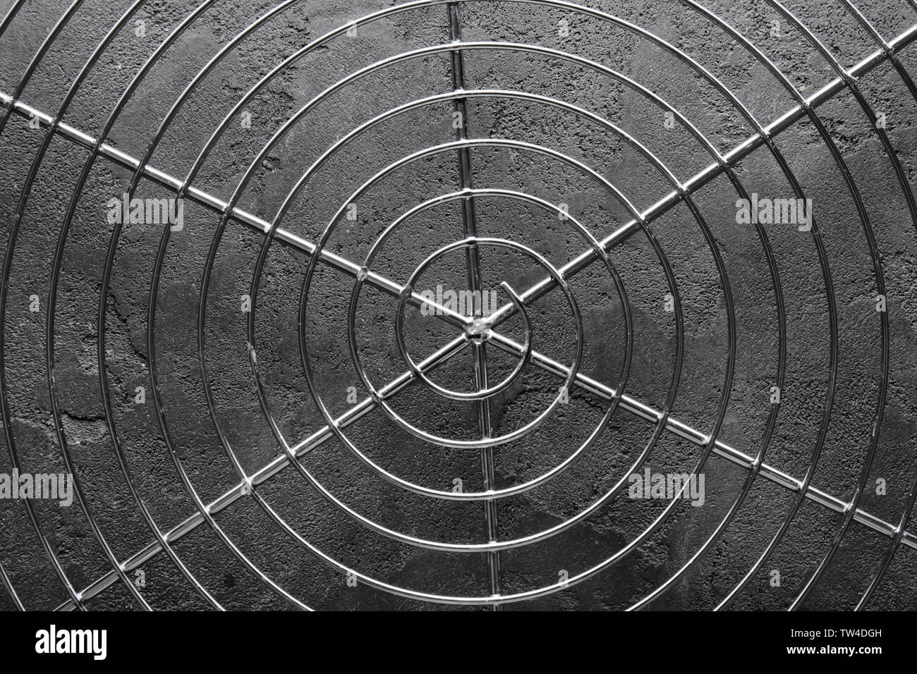 Metal cooling grid on grunge table Stock Photo - Alamy