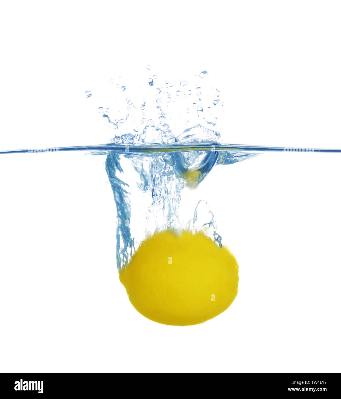 Falling lemon into water on white background Stock Photo - Alamy
