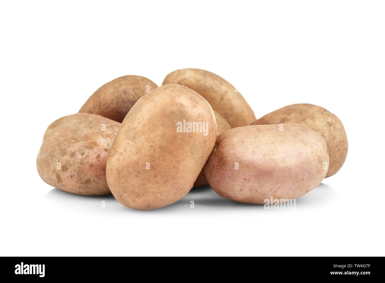 Raw unpeeled potatoes on white background Stock Photo - Alamy