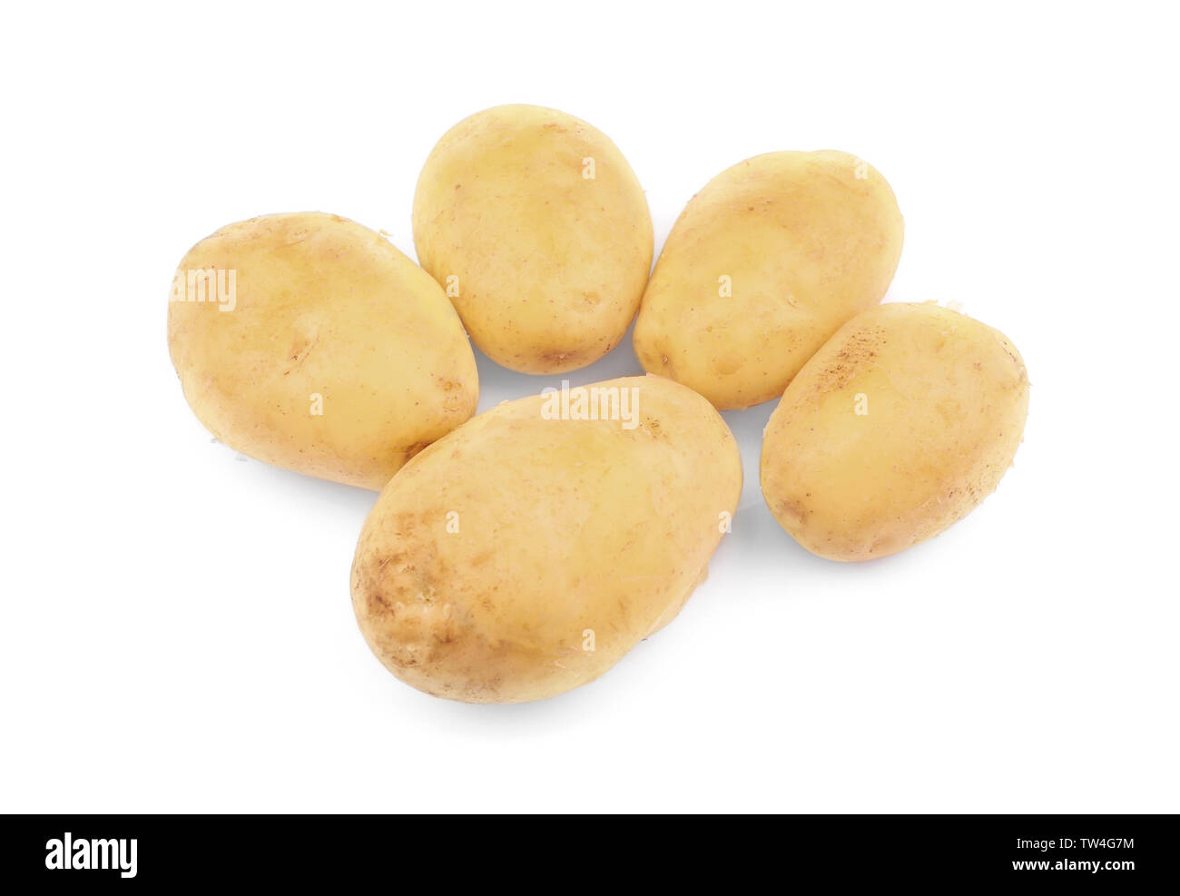 Raw unpeeled potatoes on white background Stock Photo - Alamy