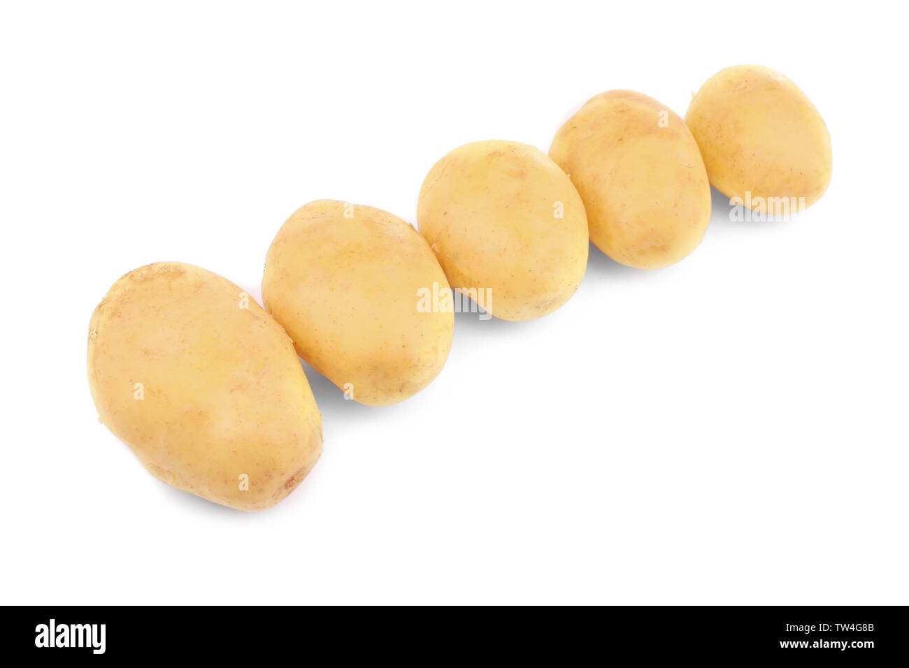 Raw unpeeled potatoes on white background Stock Photo - Alamy