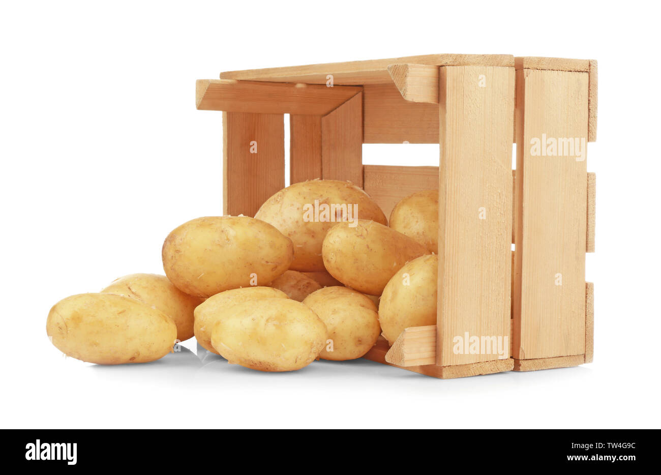 Wooden box with potatoes on white background Stock Photo - Alamy