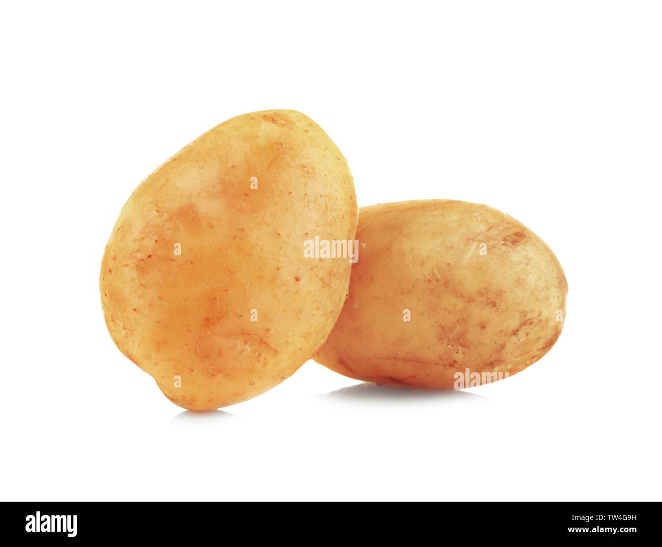 Raw unpeeled potatoes on white background Stock Photo - Alamy