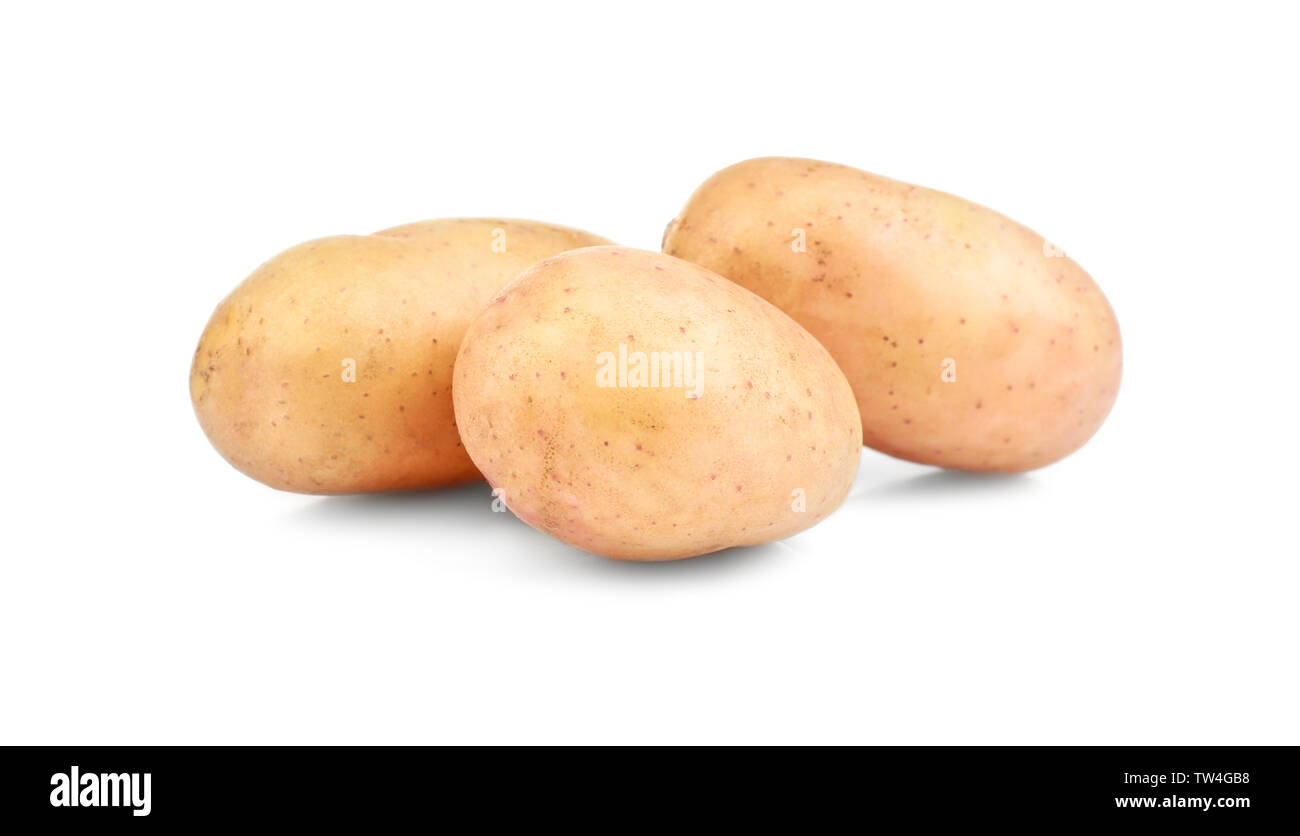Raw unpeeled potatoes on white background Stock Photo - Alamy
