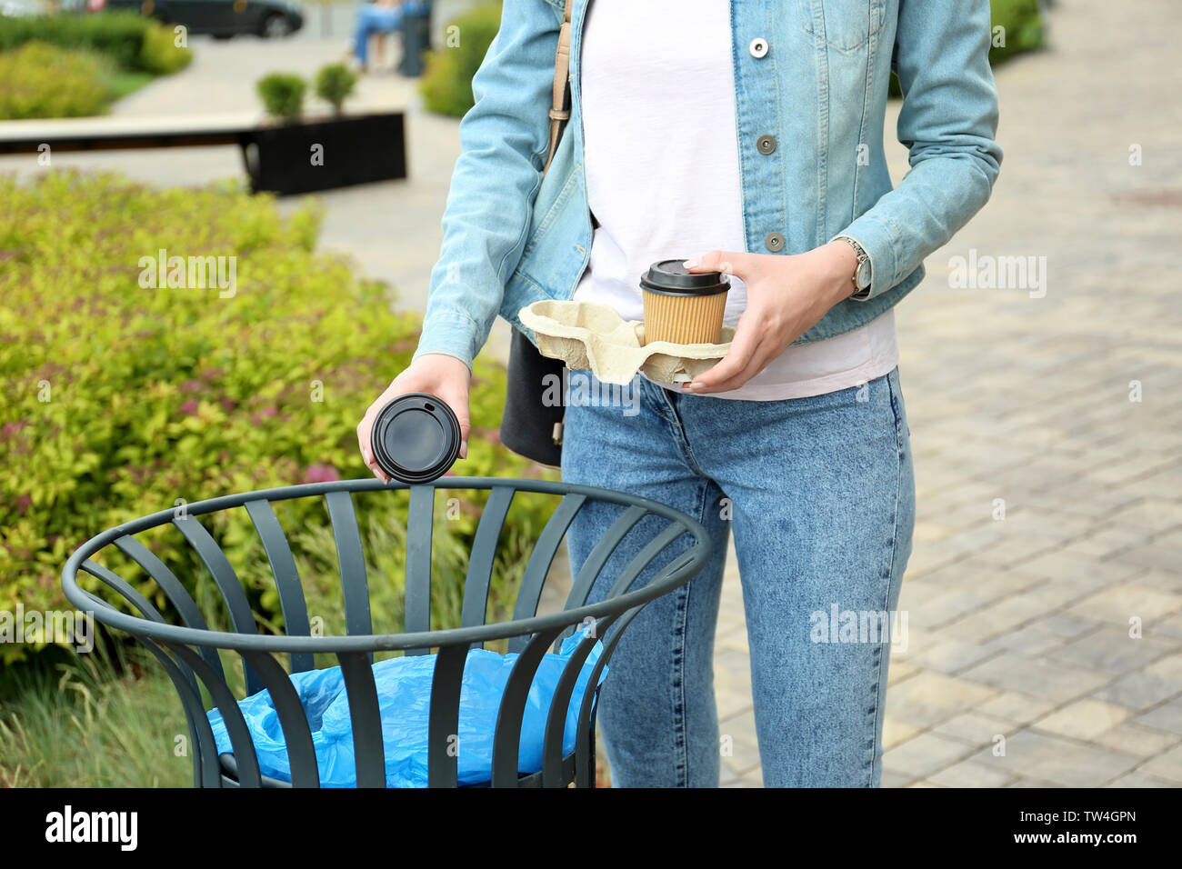 Throwing litter in park hi-res stock photography and images - Alamy