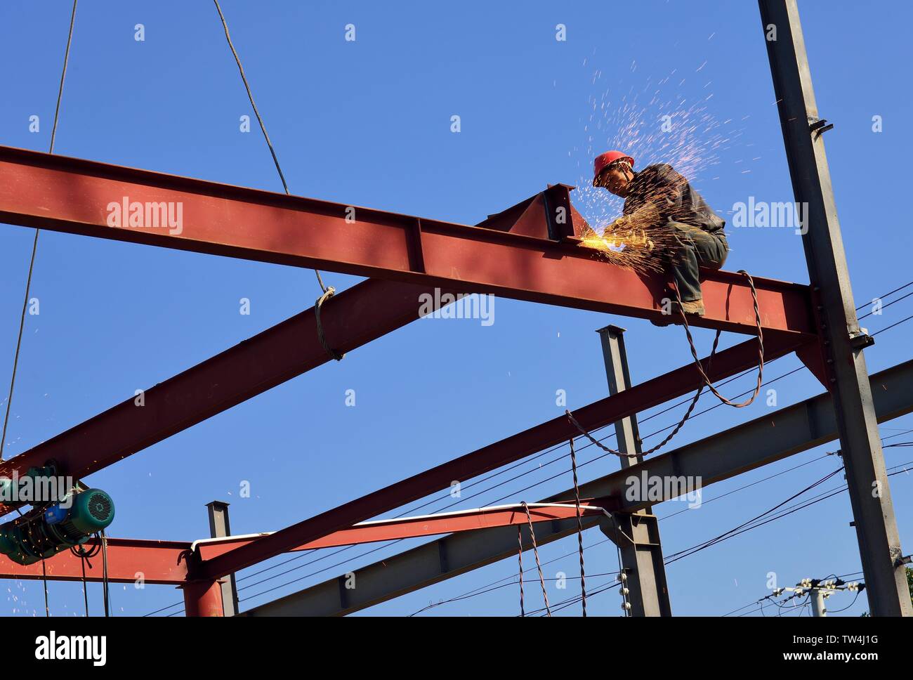 High-altitude electric welding operation Stock Photo - Alamy