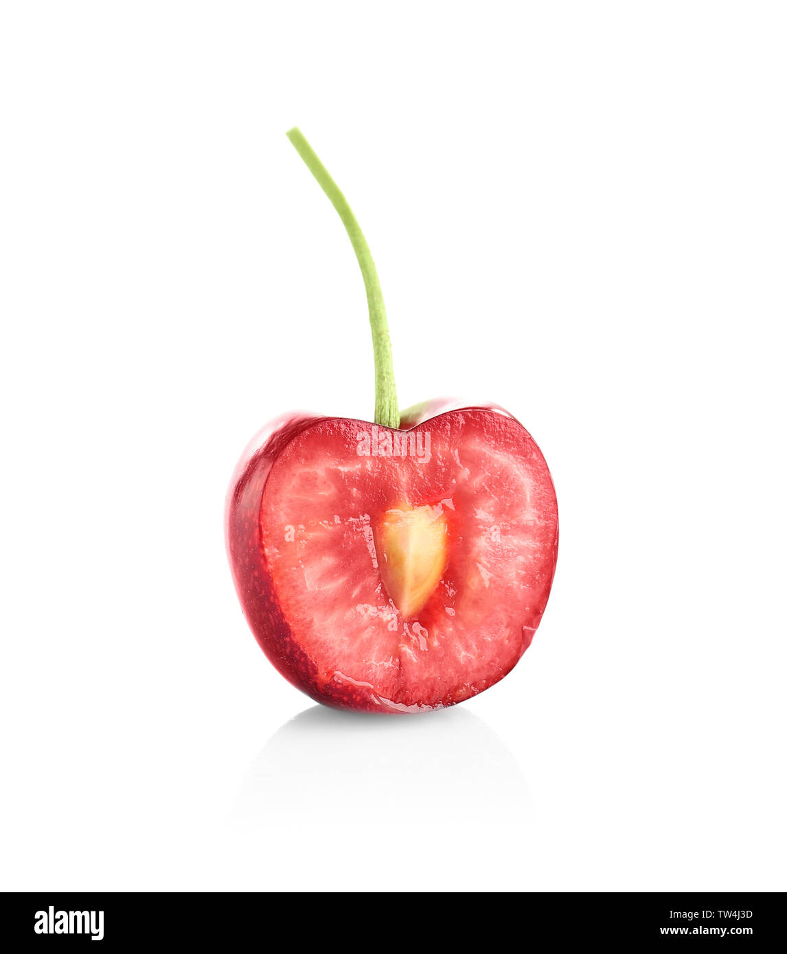 Fresh ripe cherry cut in half on white background Stock Photo - Alamy