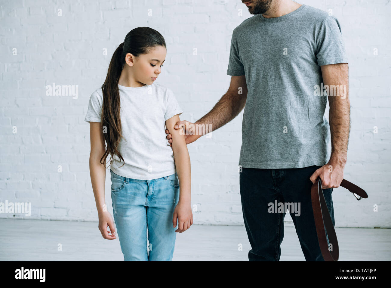 Grabbing belt hi-res stock photography and images - Alamy