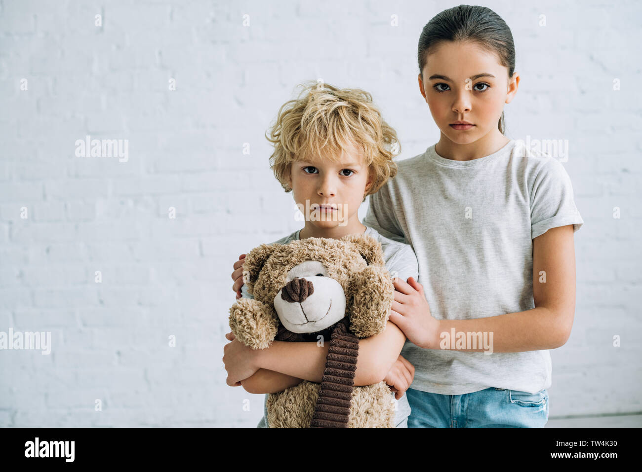 Two sister and sad hi-res stock photography and images - Alamy