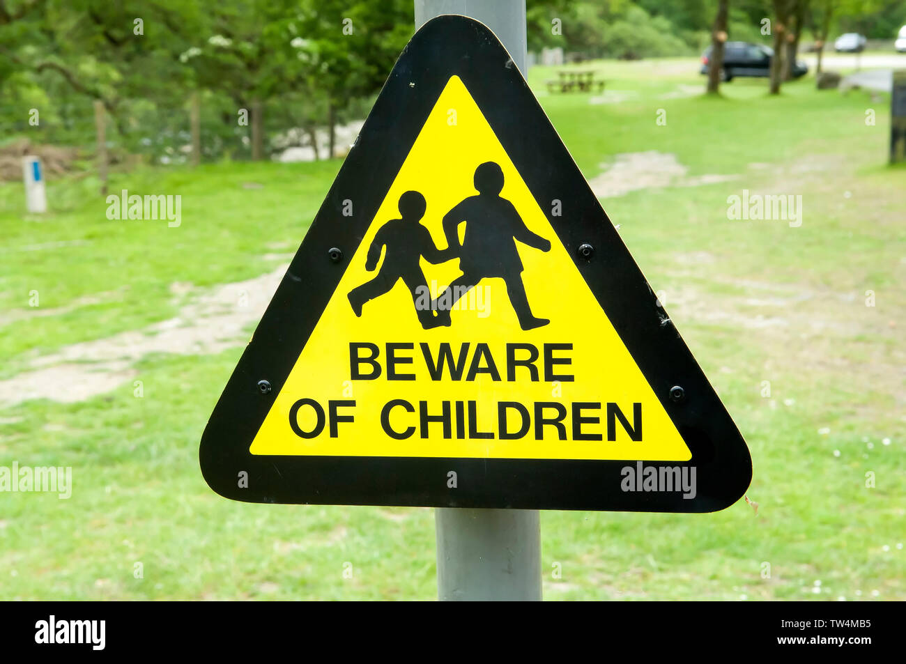 Sign telling drivers to beware of children that might be in the road ...