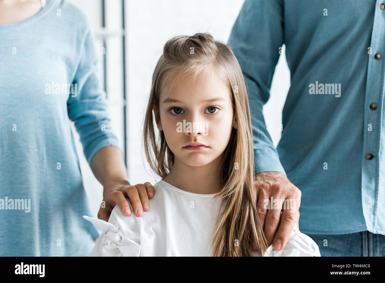 Child parents hands sad hi-res stock photography and images - Alamy